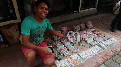 Photo Nimewo 4 - Lajan Venezyela depresyasyon tèlman bagay ke Souvenirs te kòmanse fè soti nan lajan pou vann nan touris